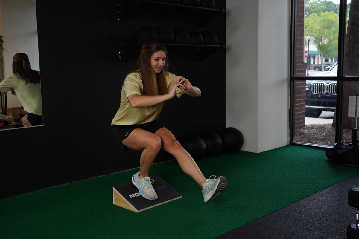 Slant Board Squat vs. Regular Squat: Which is Better for Your Goals?